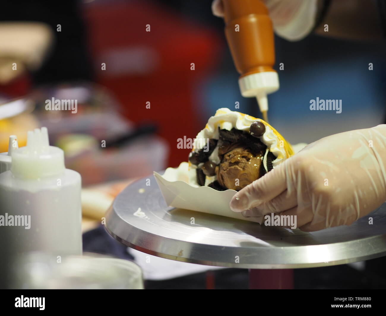 Woman making pastry cape cake Stock Photo - Alamy