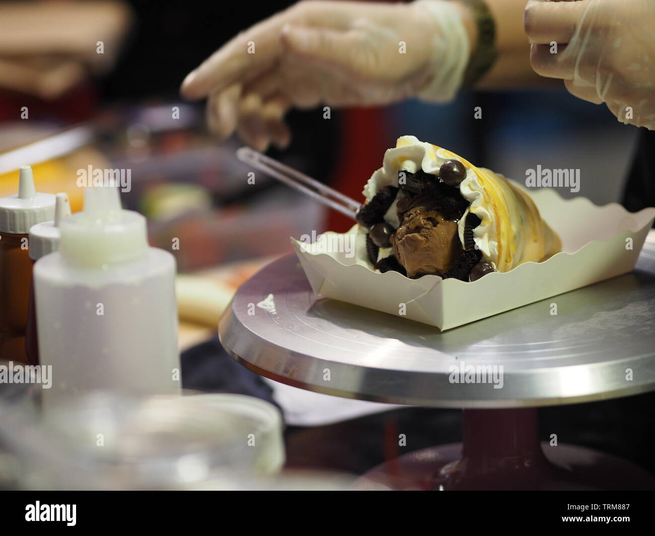 Woman making pastry cape cake Stock Photo - Alamy