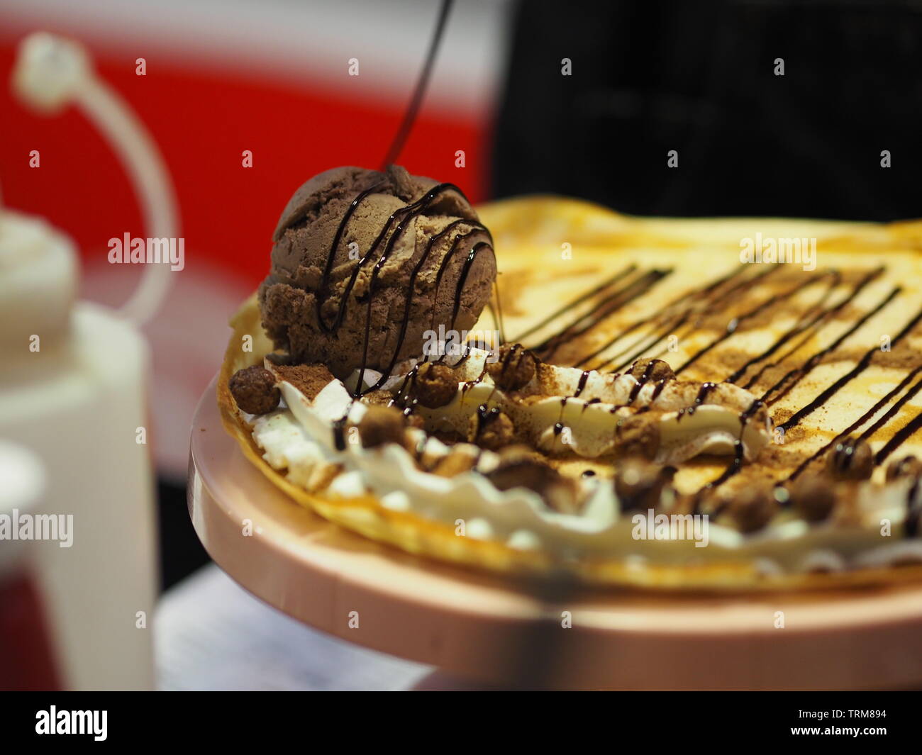 Woman making pastry cape cake Stock Photo - Alamy