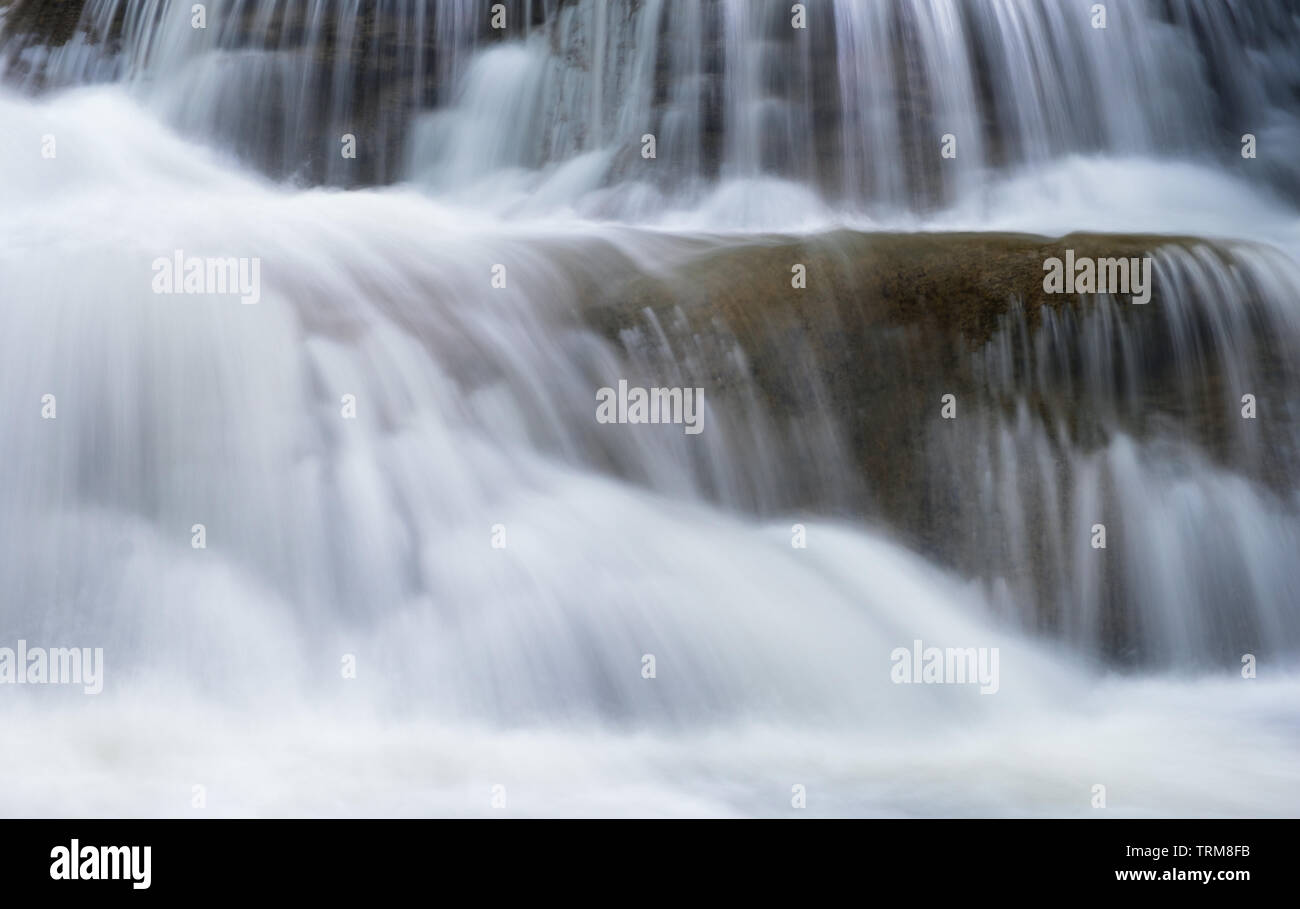 Close-up waterfall flowing on limestone Stock Photo - Alamy