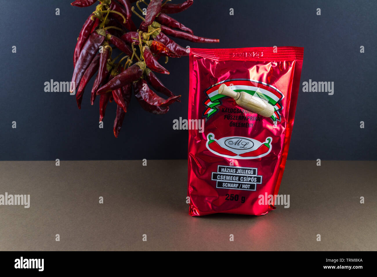 Illustrative editorial Hungarian hot paprika, peppers in background ...