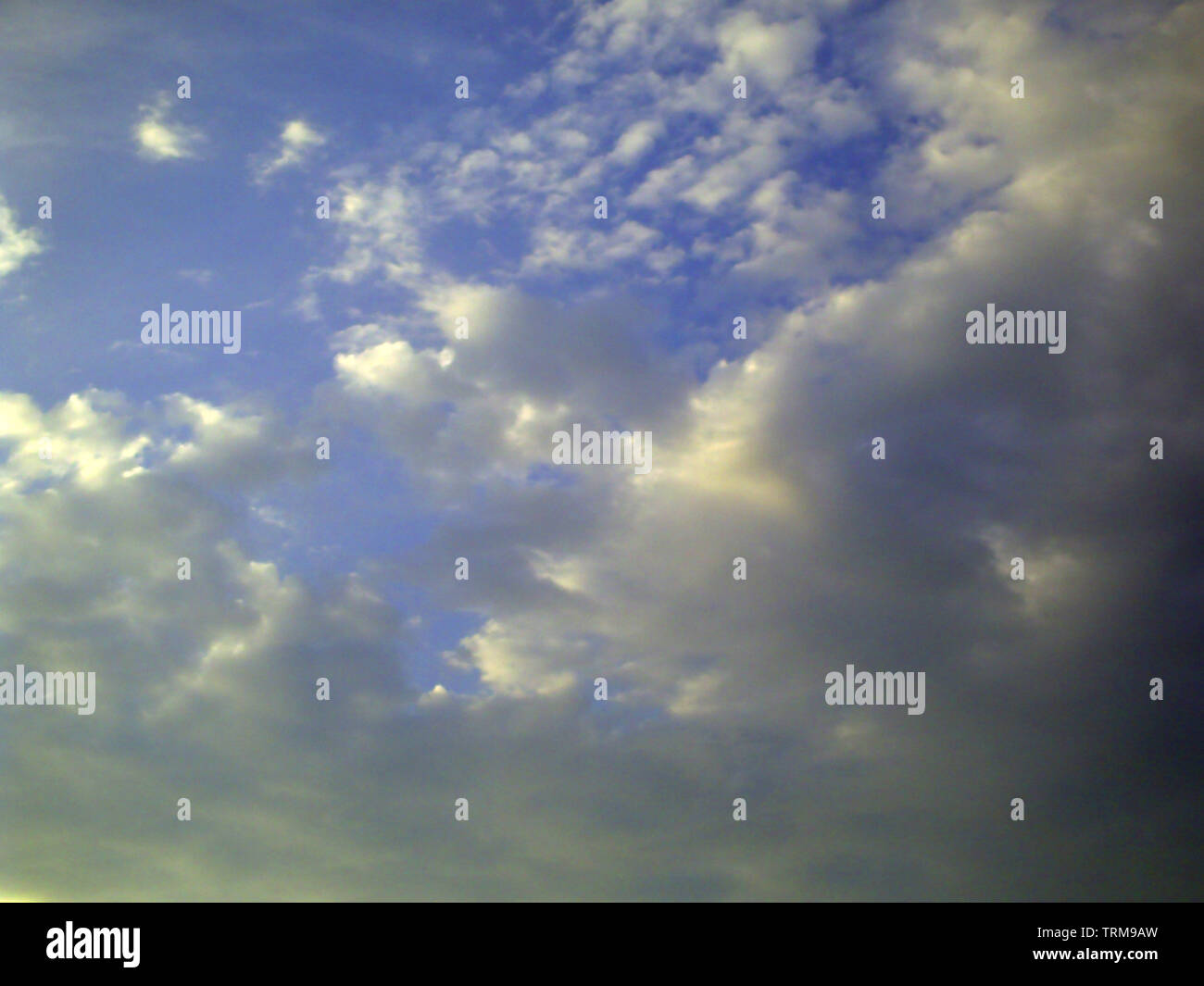 Beautiful dramatic sky with sun rays with clouds Stock Photo - Alamy