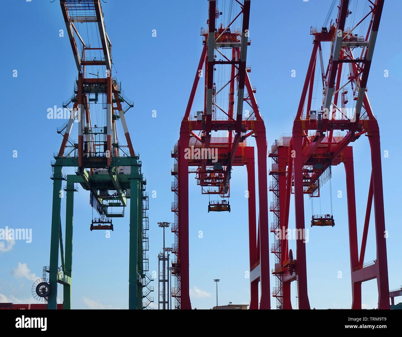 Large cranes used for loading containers on to ships Stock Photo - Alamy