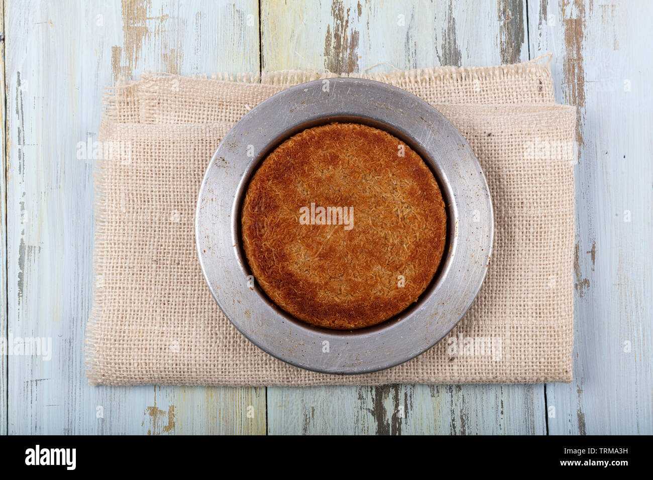 Turkish dessert kunefe, kunafa, kadayif with pistachio powder and ...