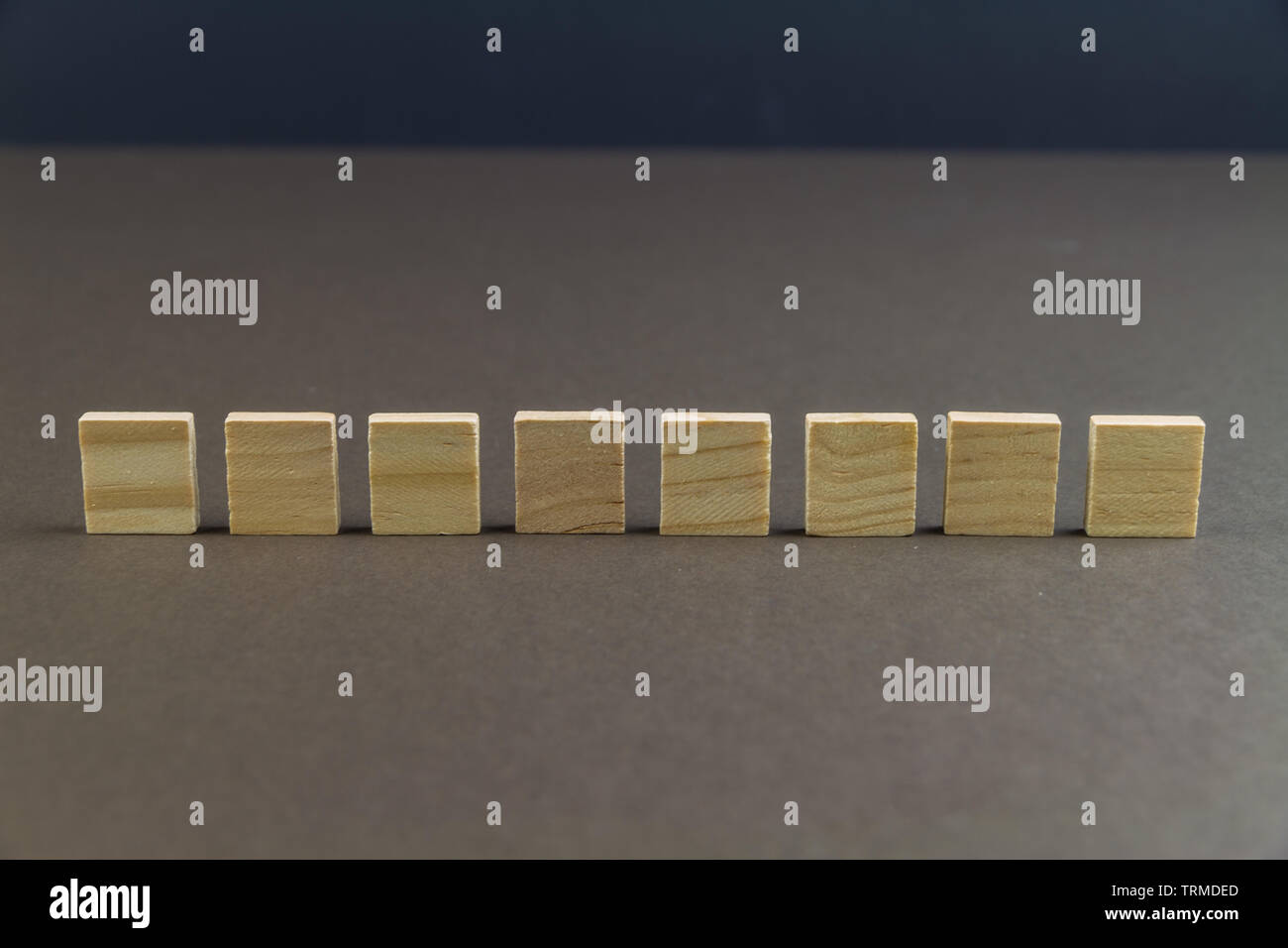 Eight wood blocks against dark background, graphic resource, template ...