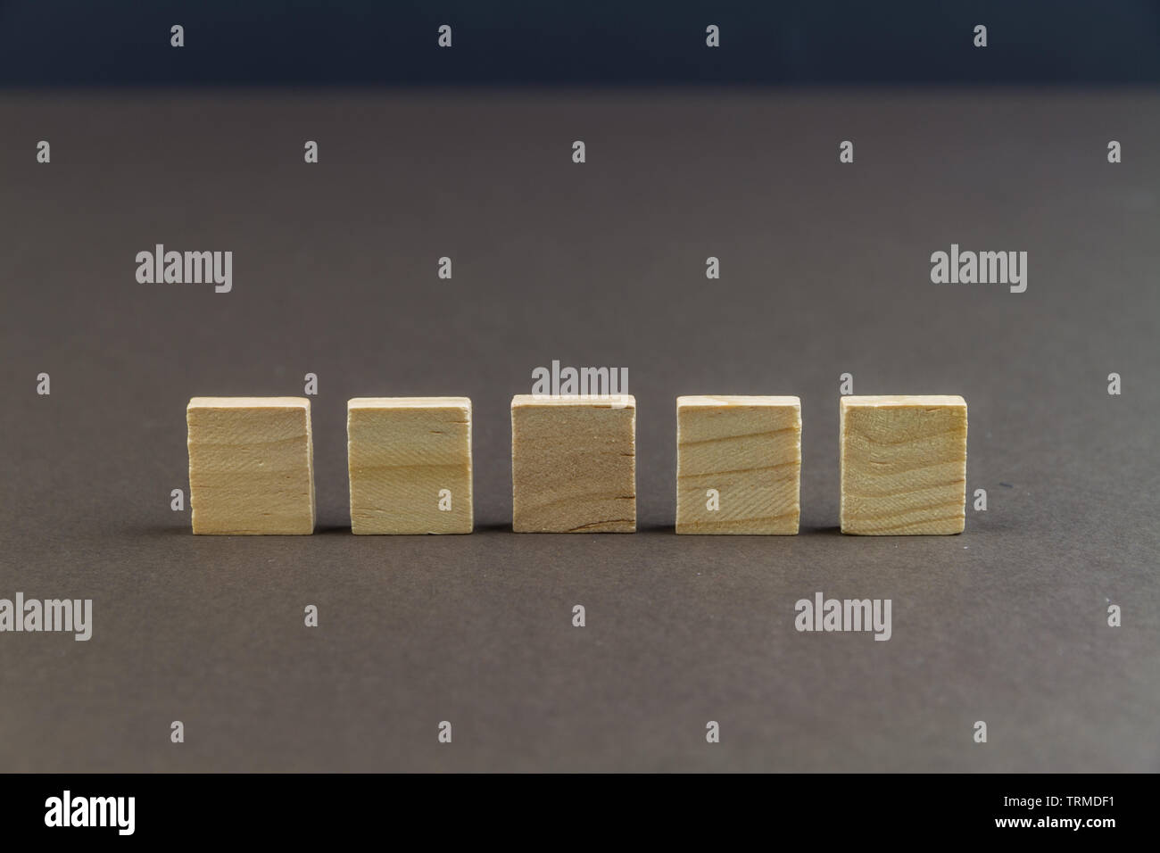Five wood blocks against dark background, graphic resource, template ...