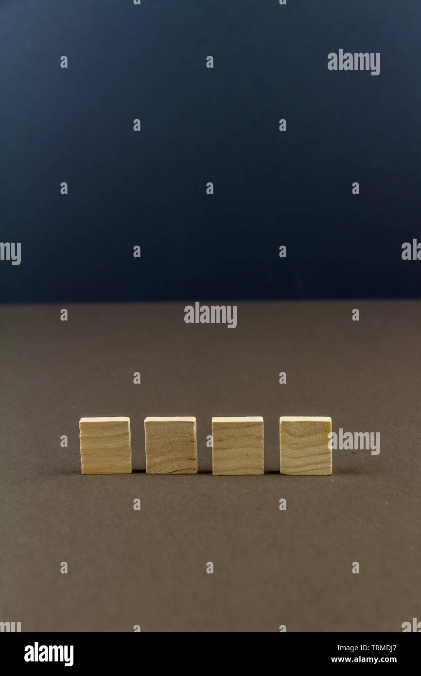 Four wood blocks against dark background, graphic resource, template ...