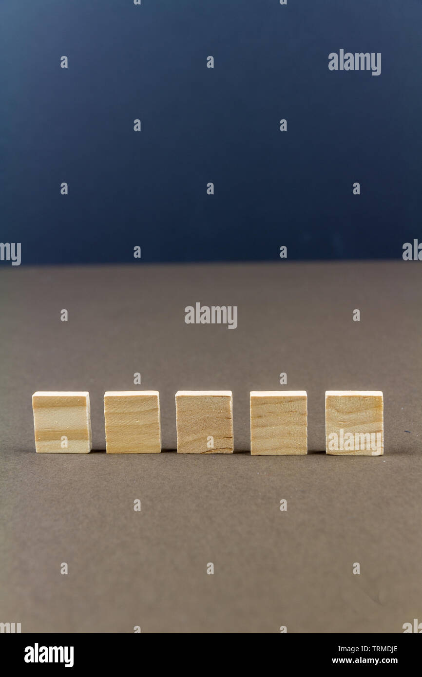 Five wood blocks against dark background, graphic resource, template ...