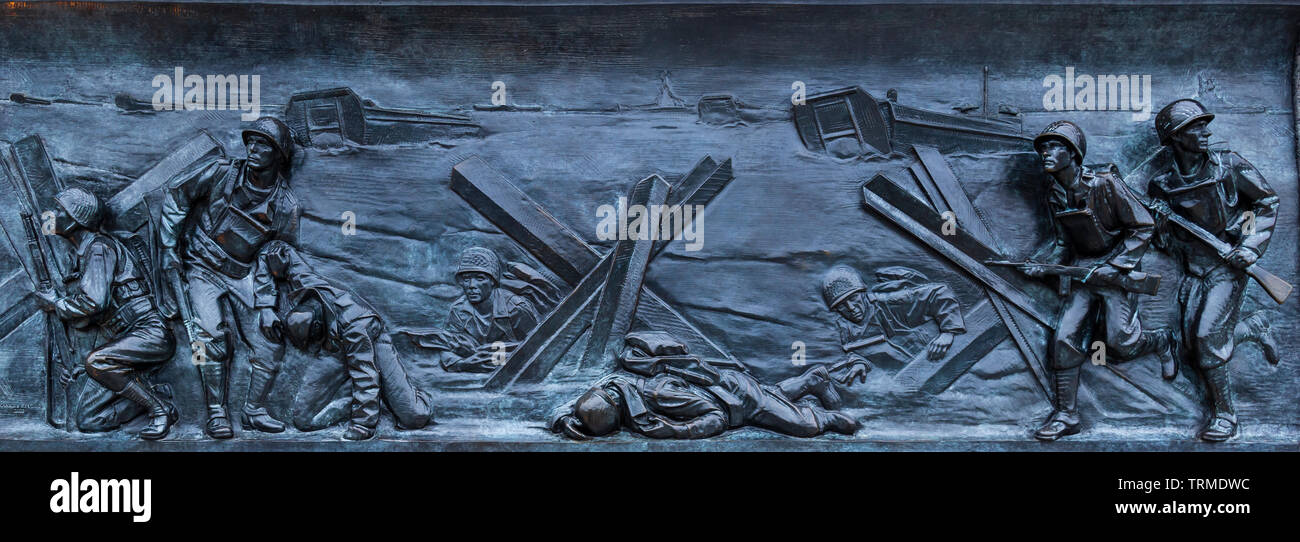 WW II Memorial. One of twenty four bronze bas-relief panel depicting ...