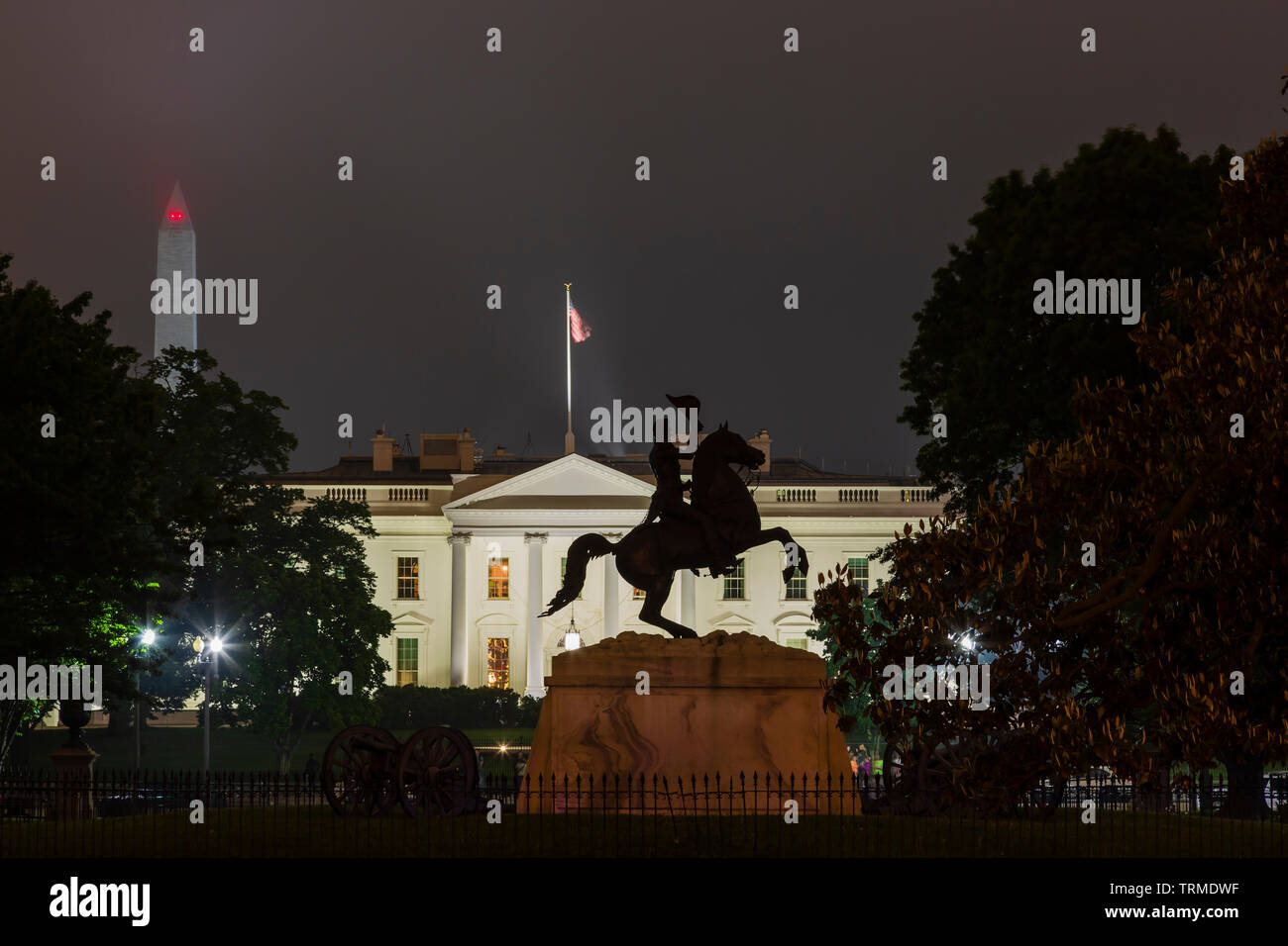 Andrew Jackson statue in Lafayette Square and The White House at night ...