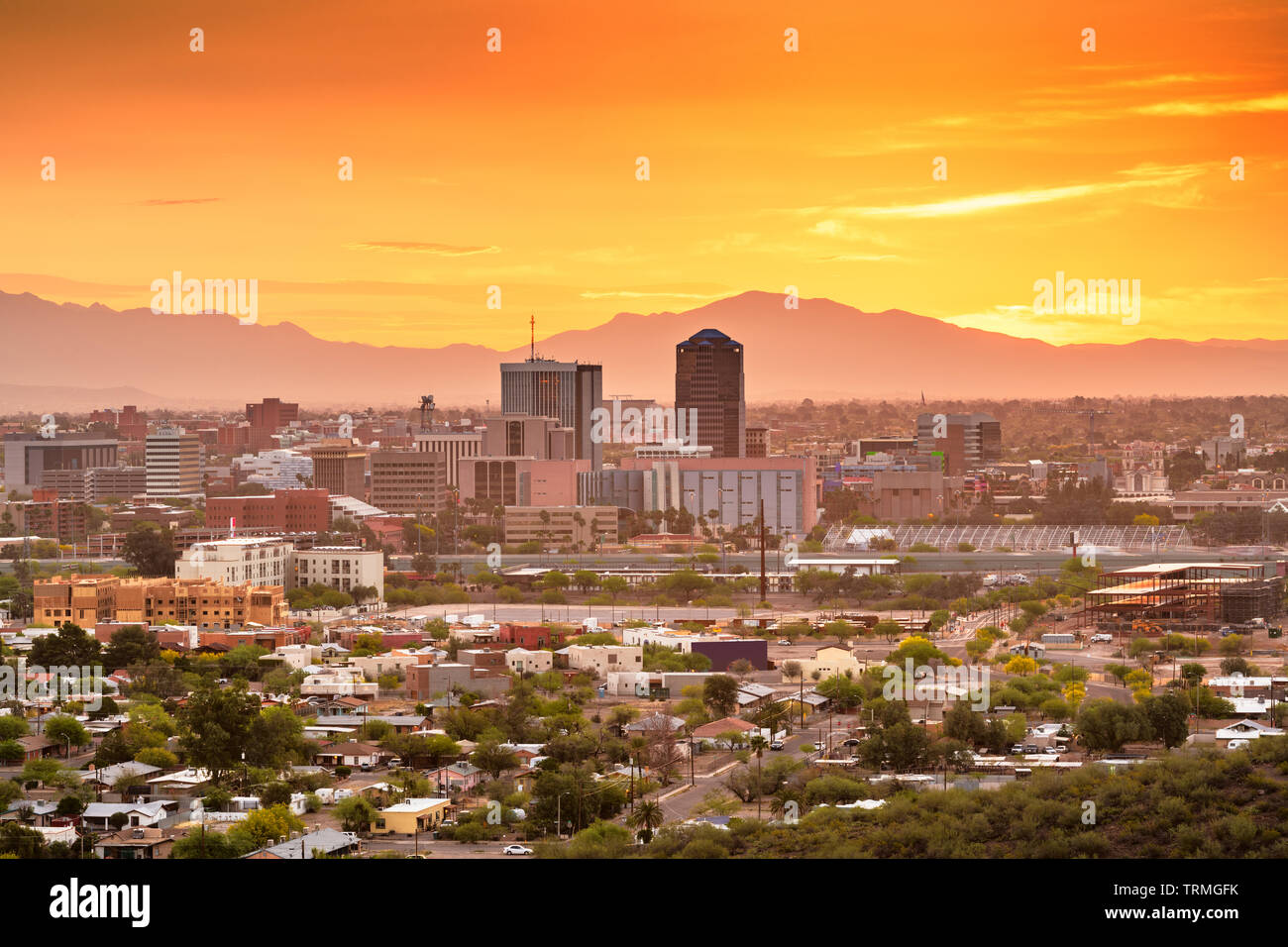 Tucson, Arizona, USA downtown city skyline with mountains at twilight ...