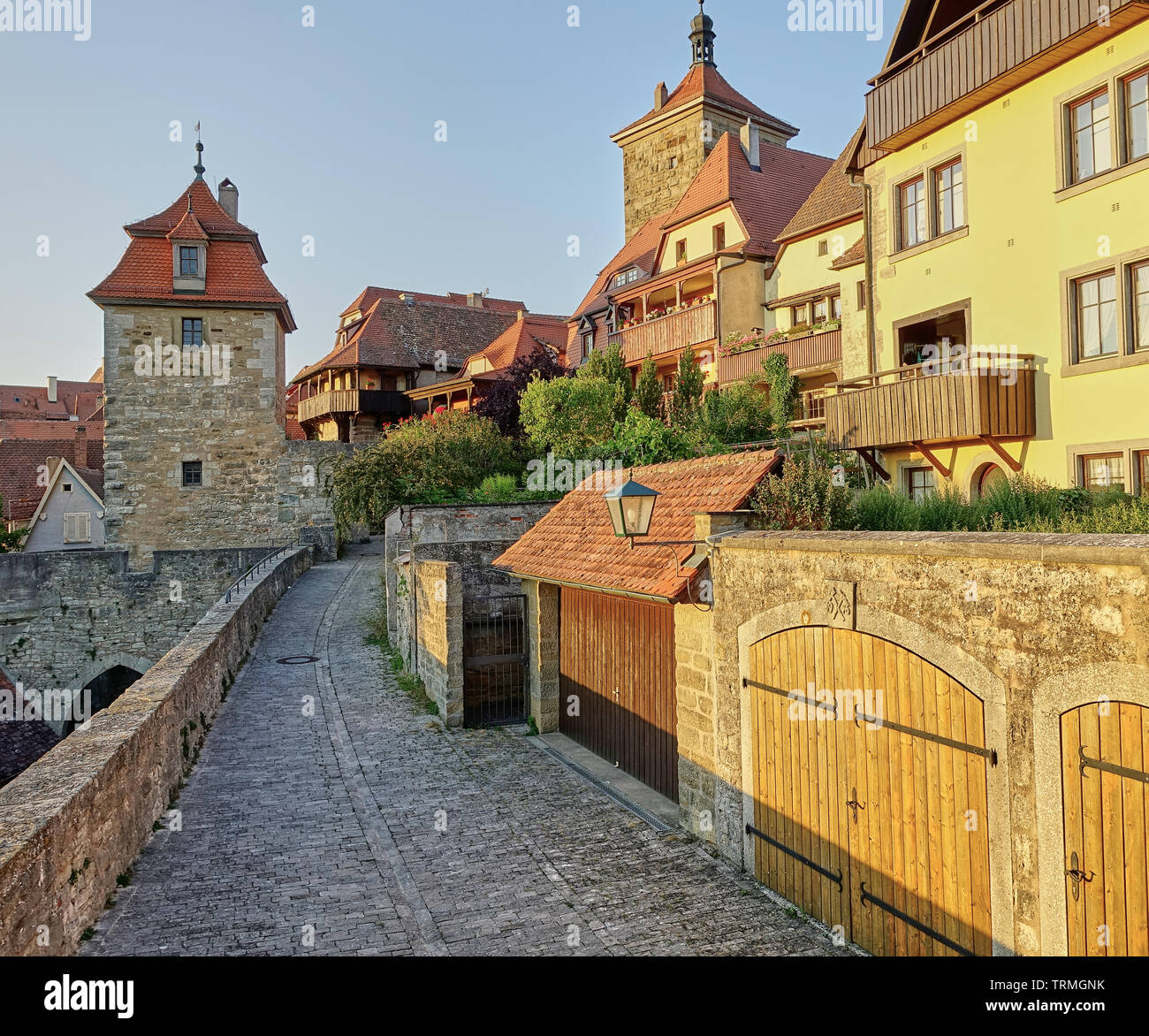 Rothenburg, Germany - Aug 2015: Golden sunset reflecting off medieval ...