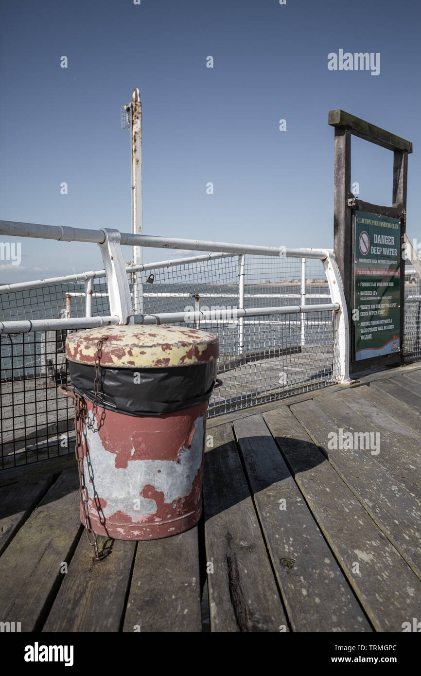 Rusted Metal Waste Bin Chained to the Floor Stock Photo - Alamy
