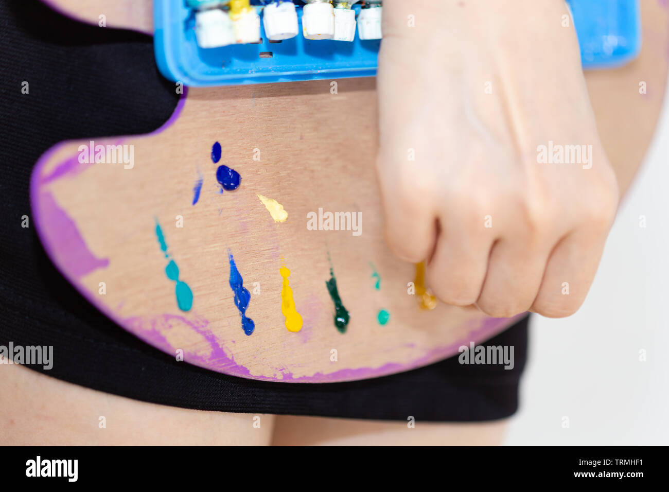 Gauche paint on artist's palette Stock Photo - Alamy