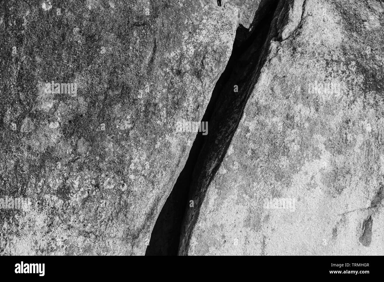 Big crack on the grey stone background Stock Photo - Alamy