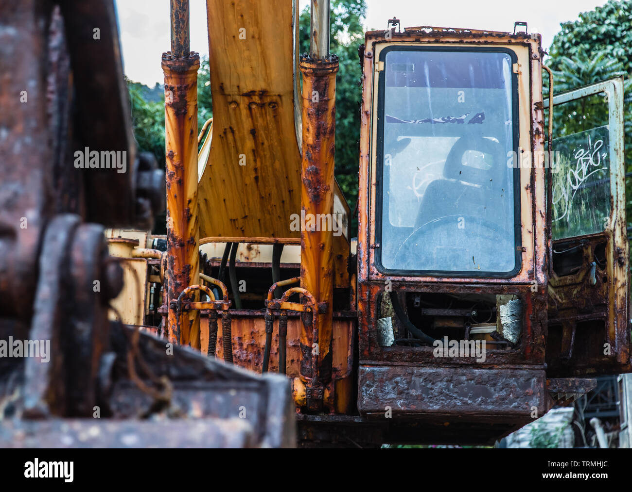 abandoned rusty and old excavator on the beach Stock Photo - Alamy