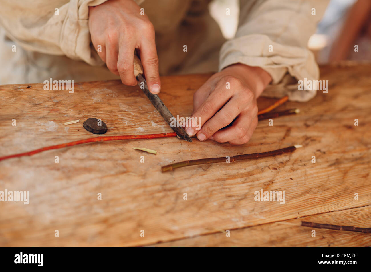 Master man weaves a basket of twigs Stock Photo - Alamy