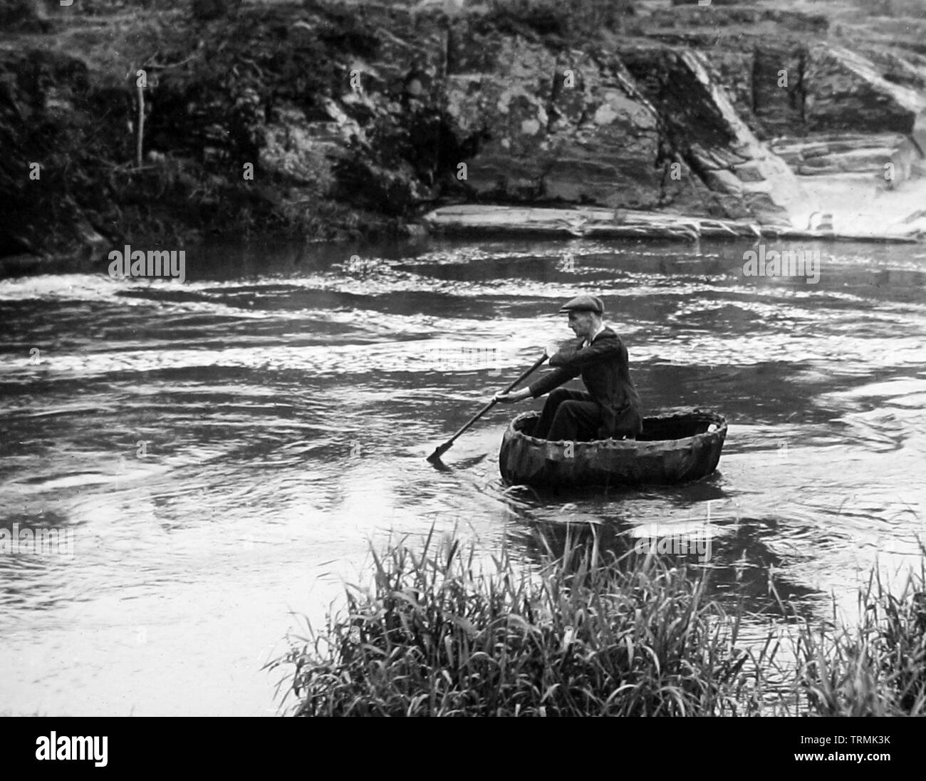 Coracle on River Teifi at Cenarth, Wales Stock Photo - Alamy