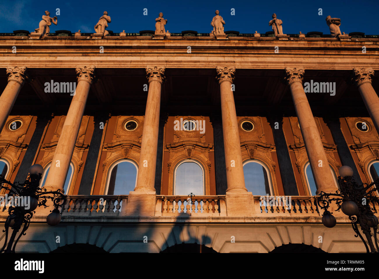 Buda castle facade at sunset Stock Photo - Alamy