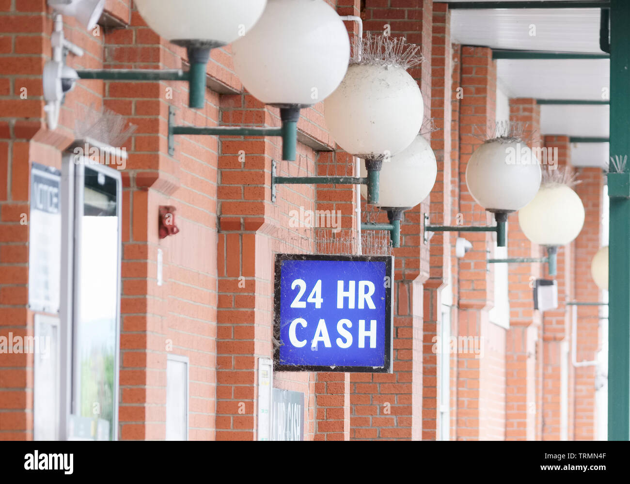 24 hour cash available sign above ATM machine at shop mall Stock Photo ...