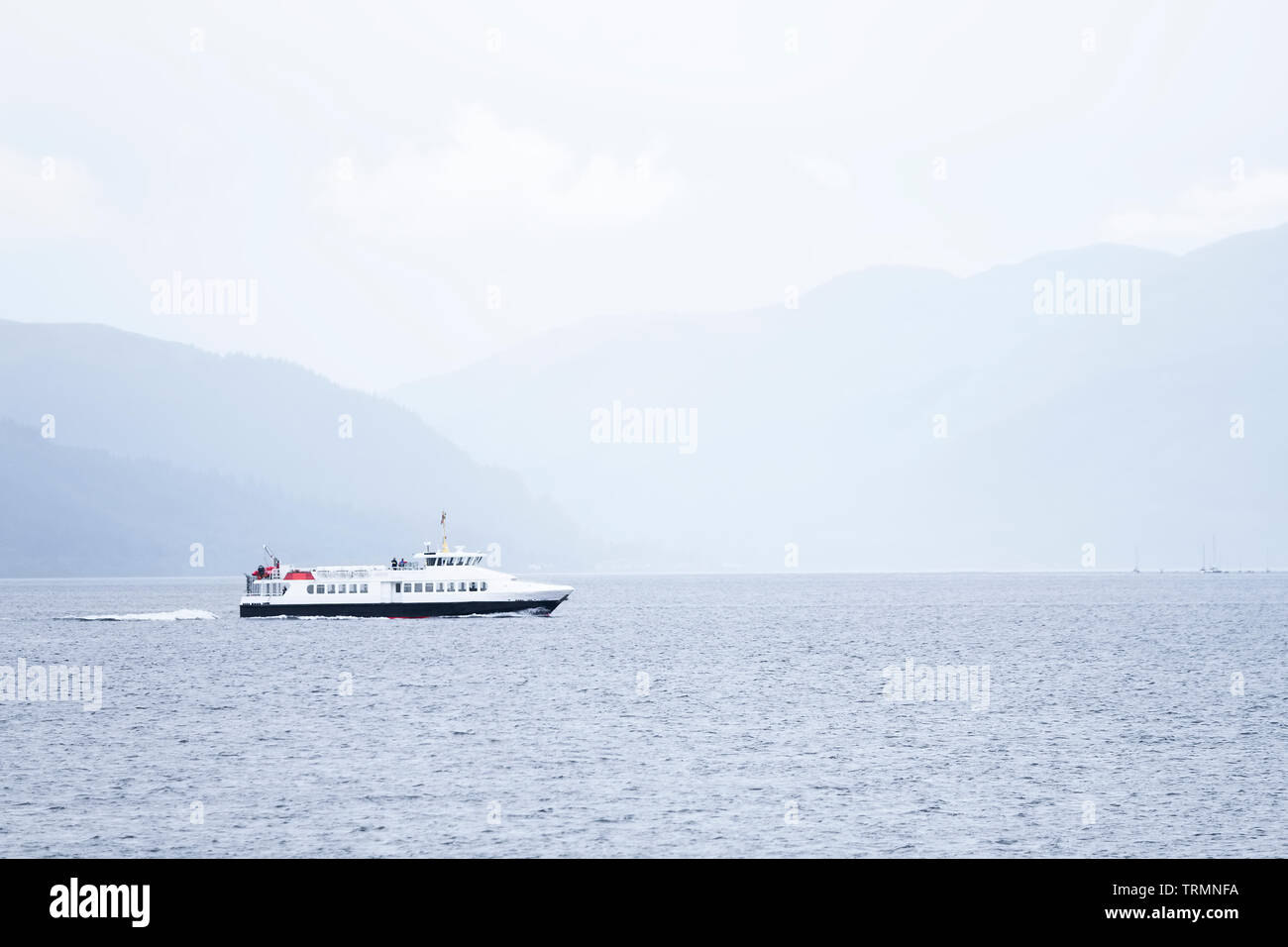 Ferry departure in Scottish sea sailing to island Stock Photo - Alamy