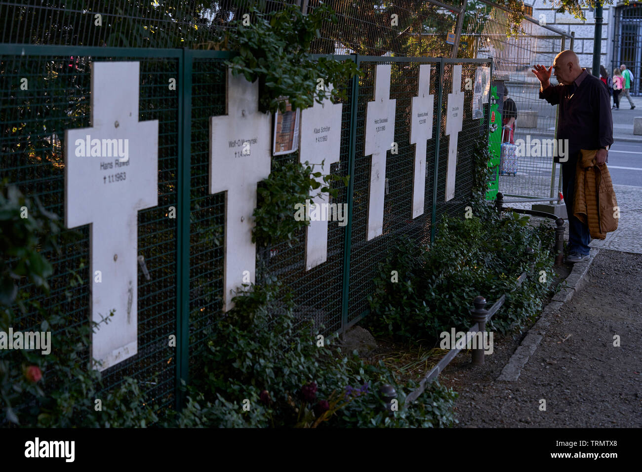 A white cross line recalls some of the people who were killed trying to ...