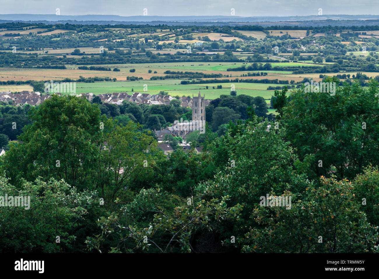 High shot across English countryside and the town and church (St ...