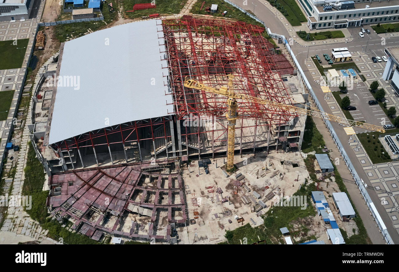 aerial view of a large industrial building with a tower crane Stock ...