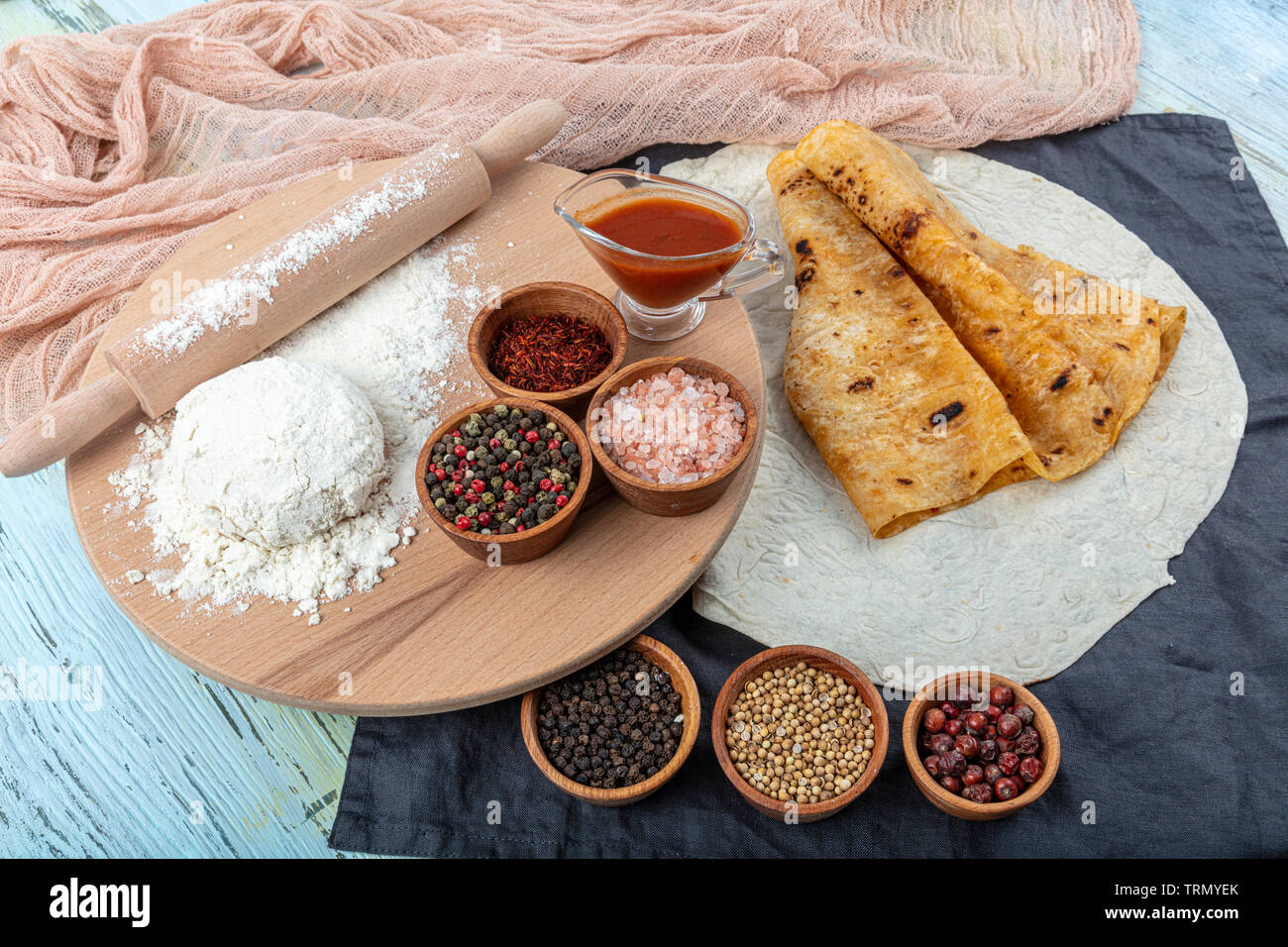 Cooking traditional Turkish Yufka ( pastries, pancake) on the stove ...