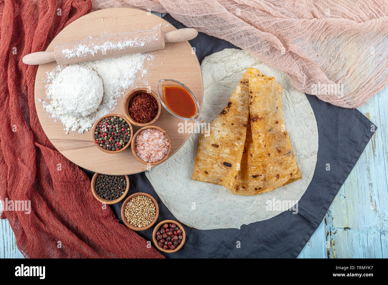Cooking traditional Turkish Yufka ( pastries, pancake) on the stove ...