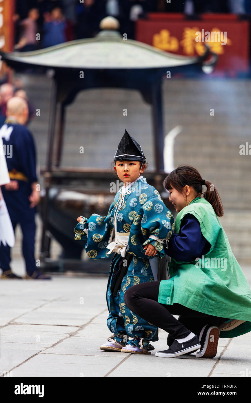 Asia, Japan, Tokyo, Asakusa, Sensoji temple, a child dressed in traditional clothes at the ...
