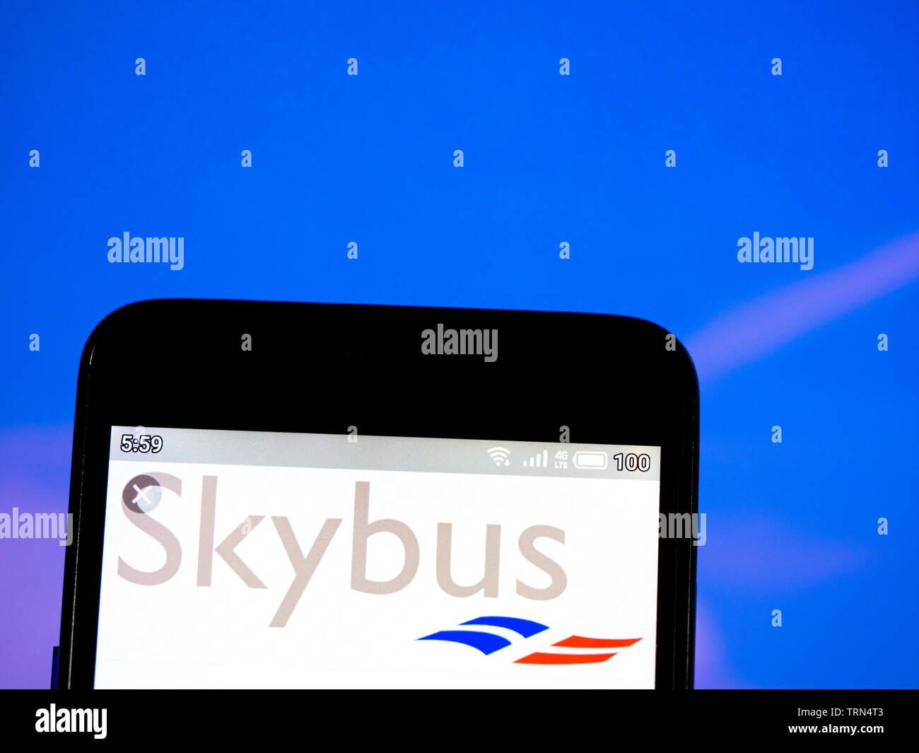 In this photo illustration the Skybus logo is seen displayed on a ...