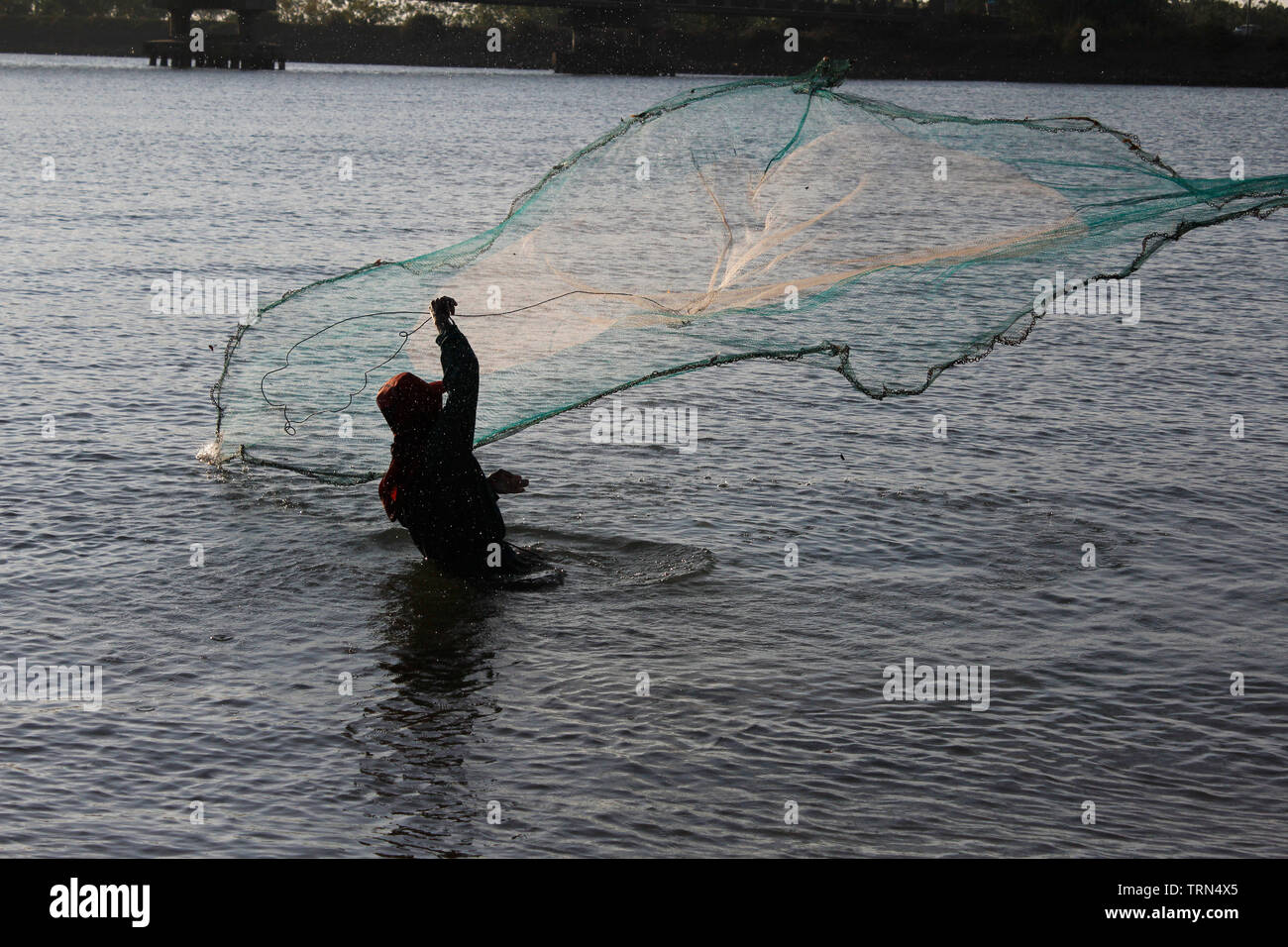 fishermen catch fish in the sea Stock Photo - Alamy