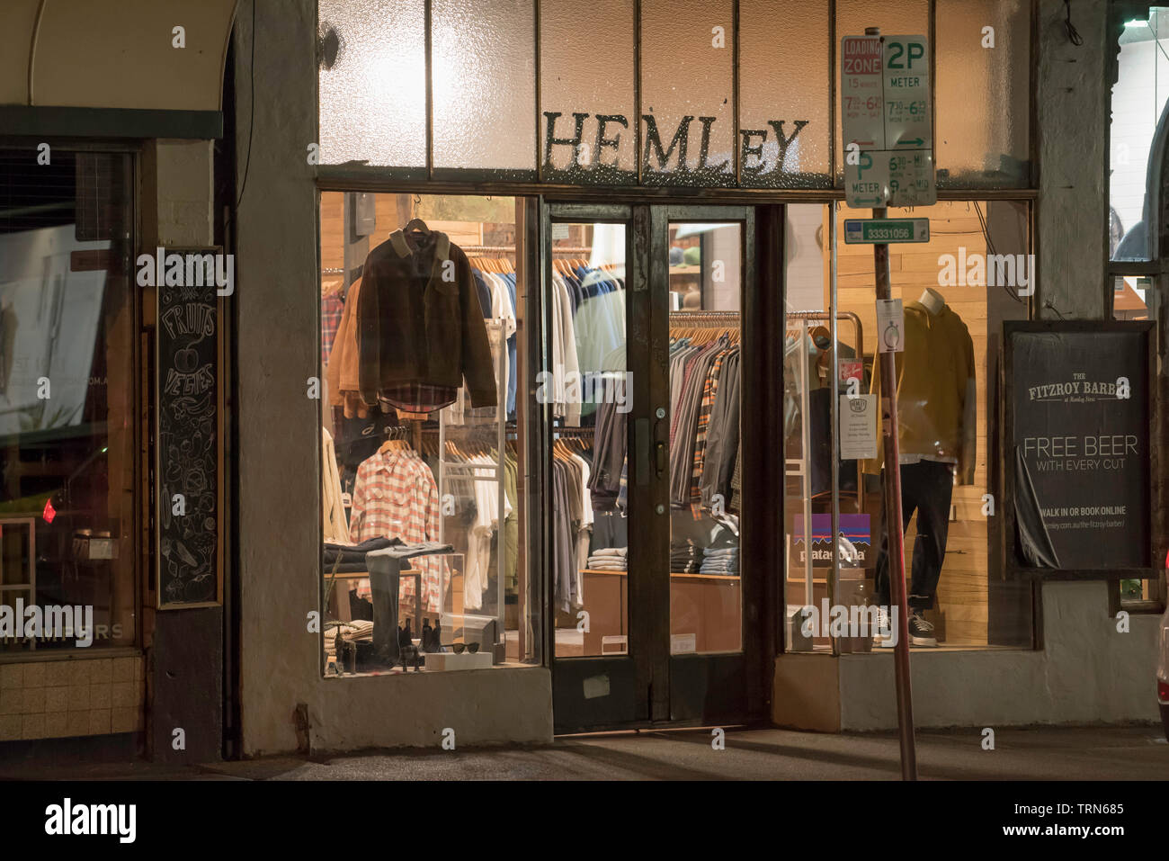 A clothing retail shop at night on Brunswick Street, Fitzroy, Victoria ...