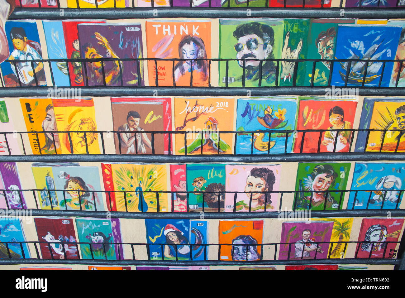 Wall mural drawing depicts traditional way of selling books and ...