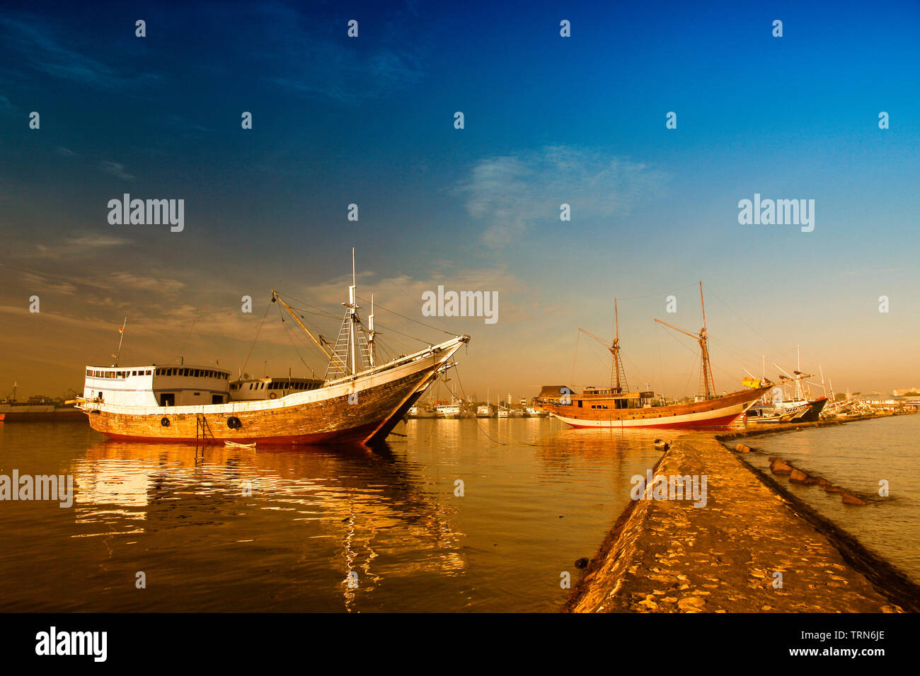 Phinisi ship - Traditional wooden sailing ships at Paotere Harbor Stock ...