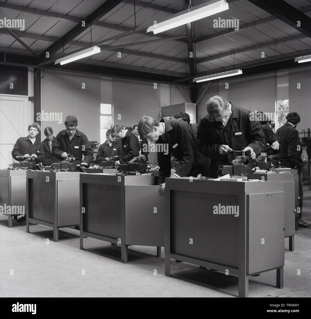 1967, historical, young male apprentices wearing uniformed overalls and ...