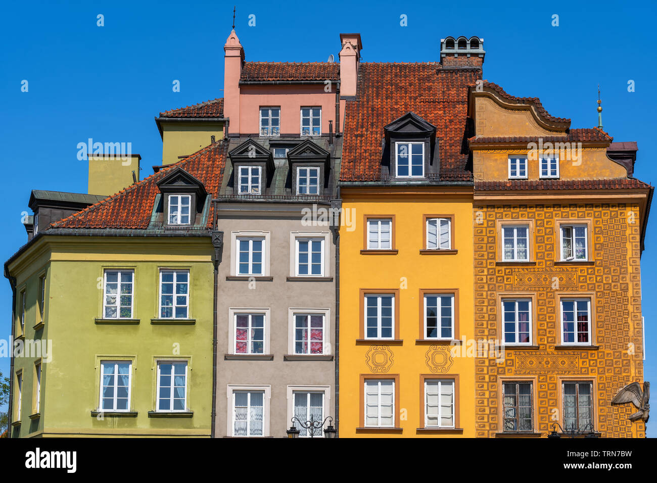 Colorful historic tenement houses in the Old Town of Warsaw city in ...