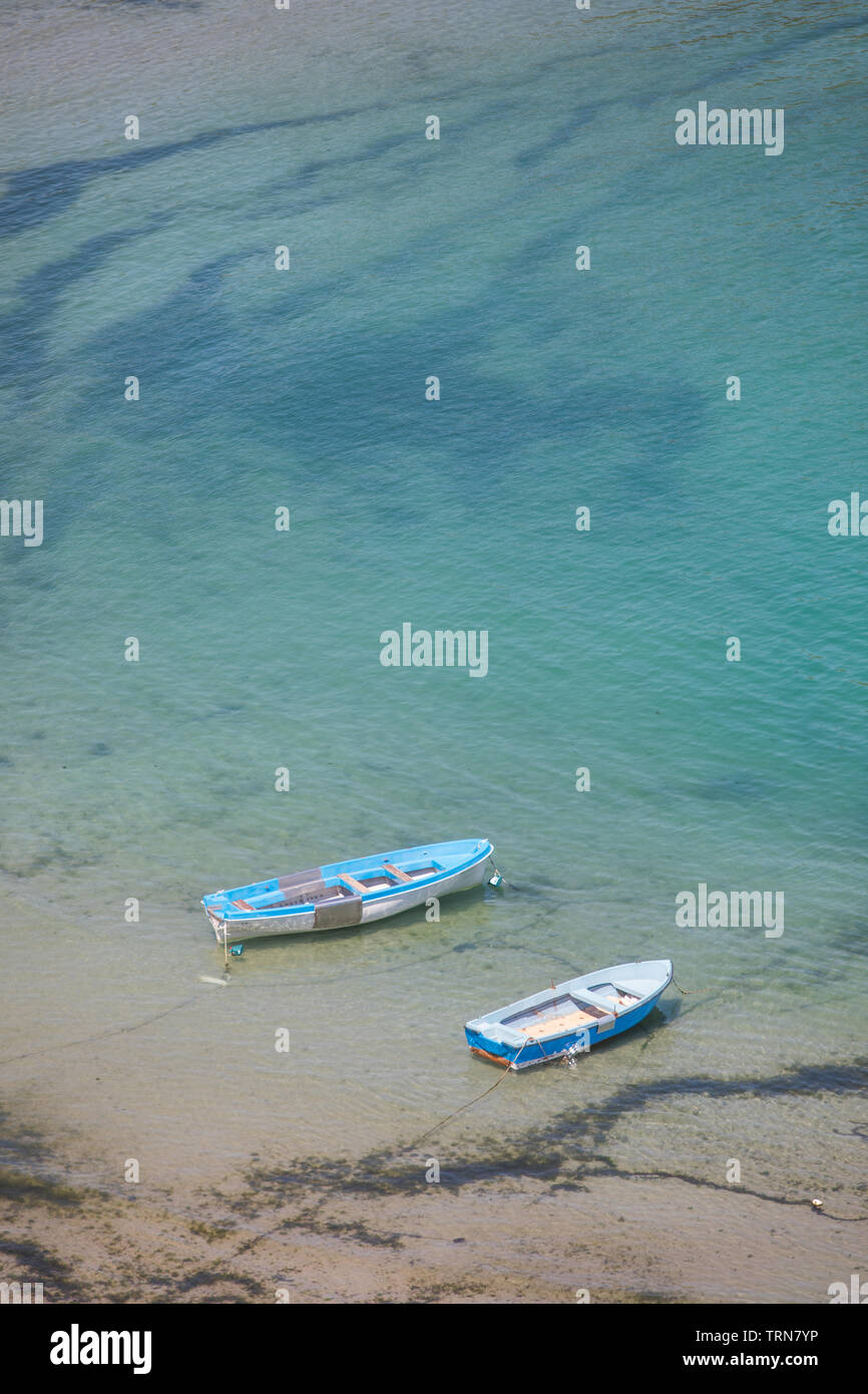 High angle view of two boats floating on blue water Stock Photo - Alamy