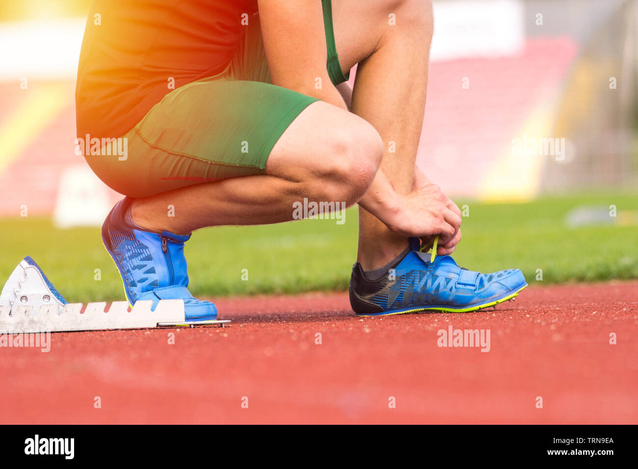 Athlete focused starting block hi-res stock photography and images - Alamy