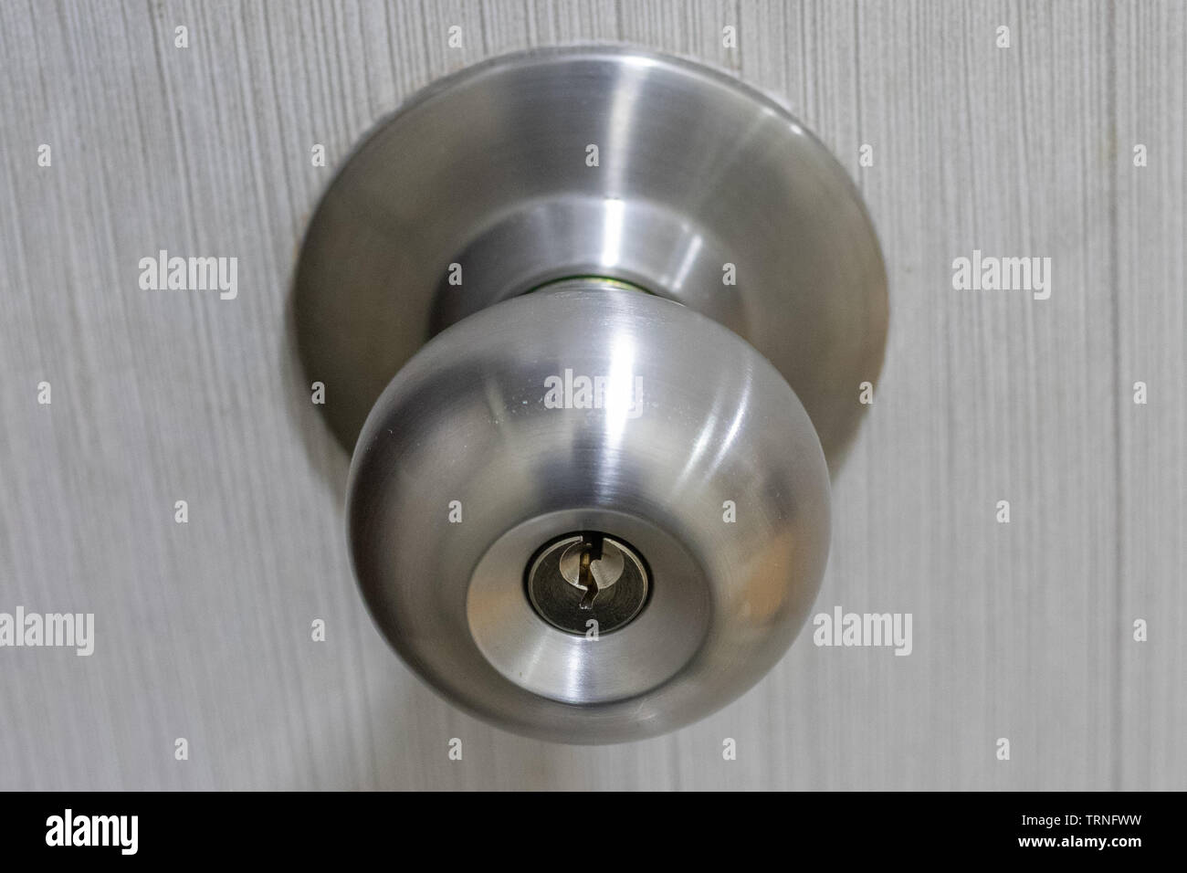 Door lock with a keyhole Stock Photo - Alamy