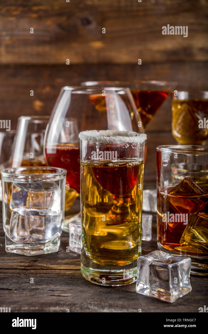 Assortment various hard and strong alcoholic drinks in different ...
