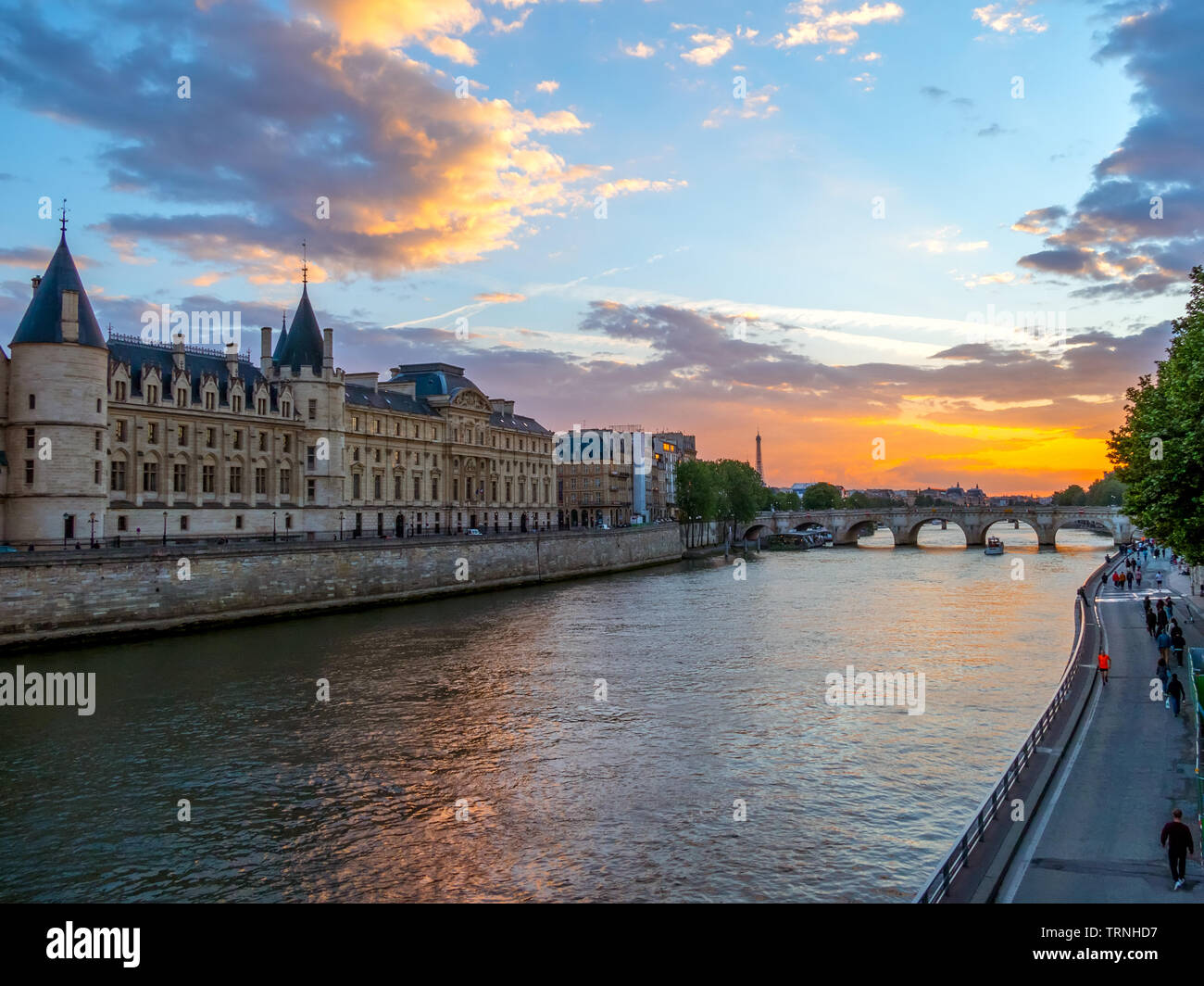 France. Paris. Summer evening and sunset over the bridges of the river ...