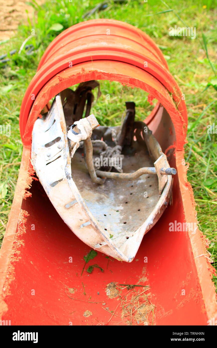 Strainer was bent and wedged in a sewer pipe Stock Photo - Alamy