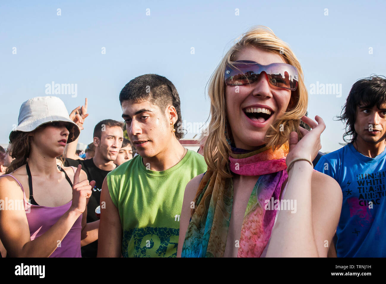 Pretty girl smiling at Anti-Sonar free illegal squat party rave outside ...