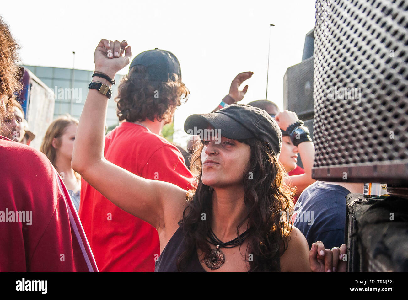 Cool girl dancing with hand in the air at Anti-Sonar free illegal squat ...