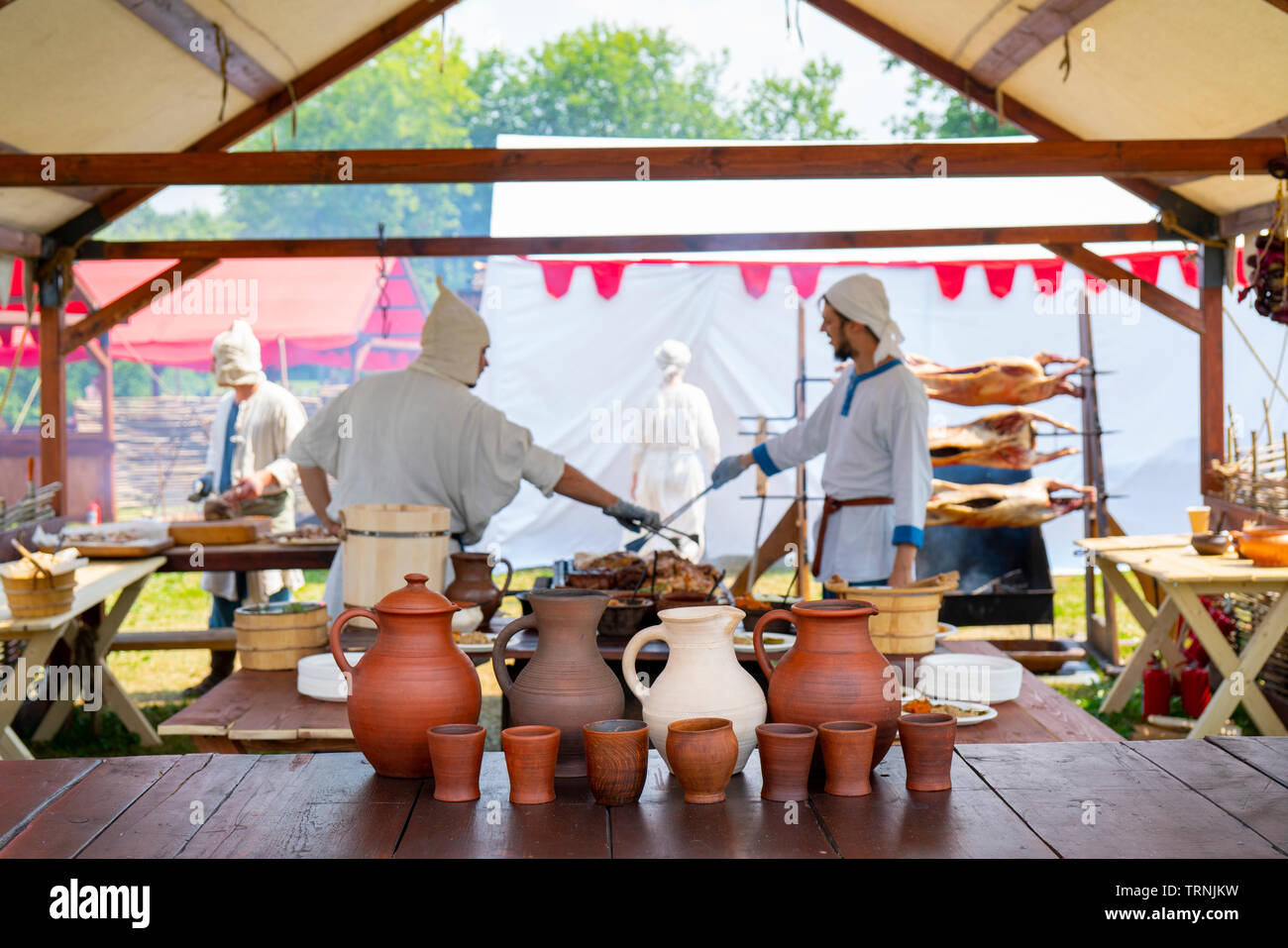 Handmade ceramic clay products. Jugs and glasses Stock Photo - Alamy