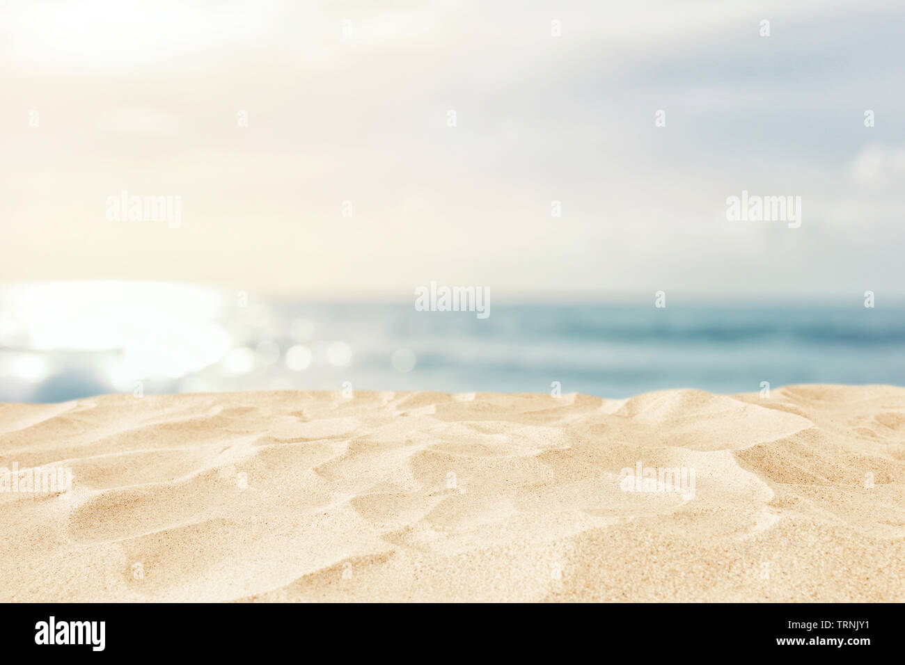 Empty sand beach in front of summer sea background with copy space ...