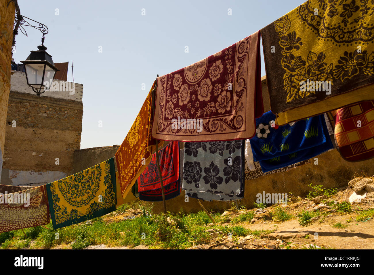 carpets drying after laundry in chefchaouen, morocco Stock Photo - Alamy