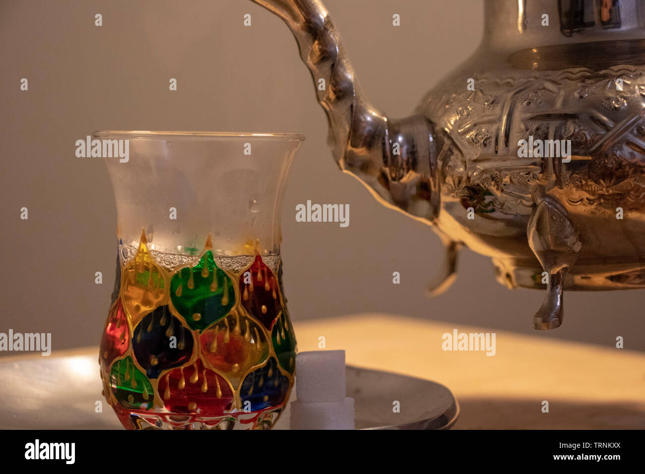 Pouring a glass of moroccan tea hi-res stock photography and images - Alamy